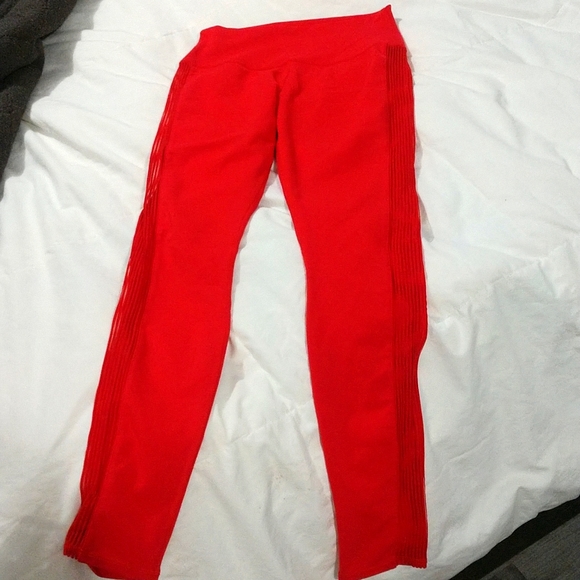 ALO Yoga | Pants & Jumpsuits | Alo Yoga Red Leggings With Side Stripe Vent | Poshmark